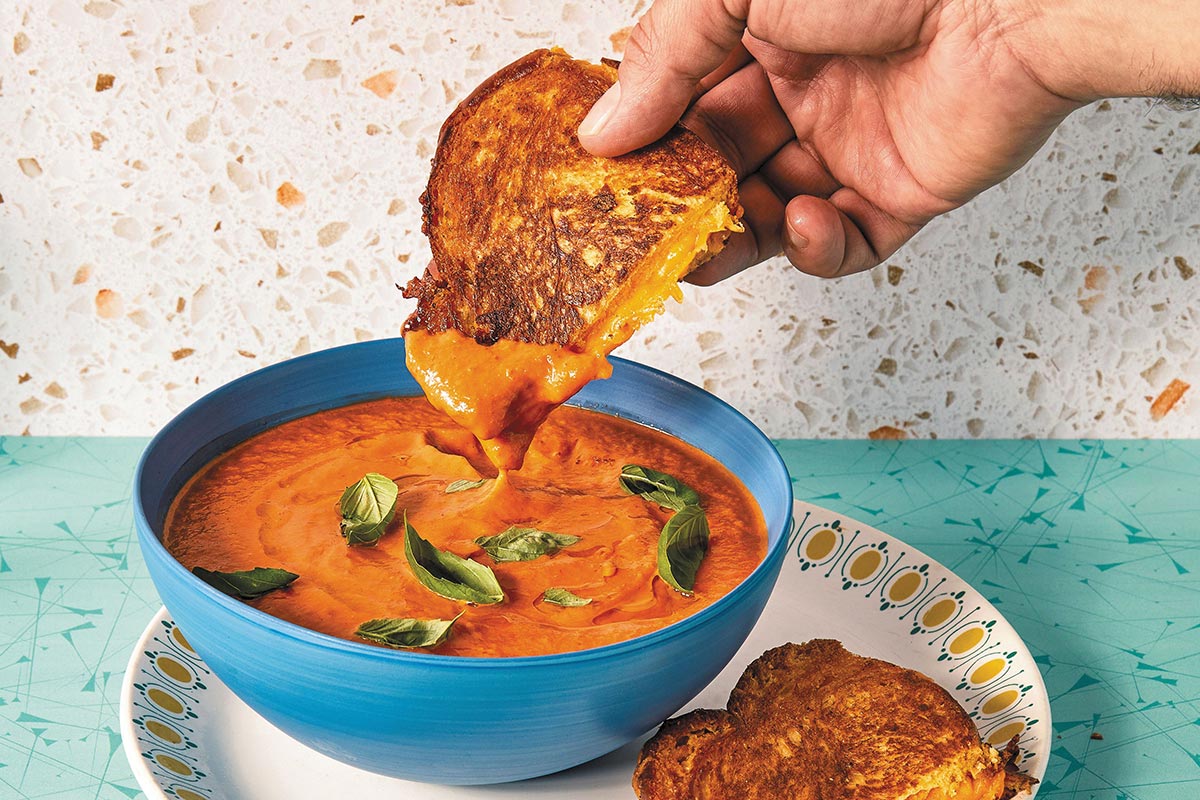 Harissa tomato bisque with challah grilled cheese - Unpacked